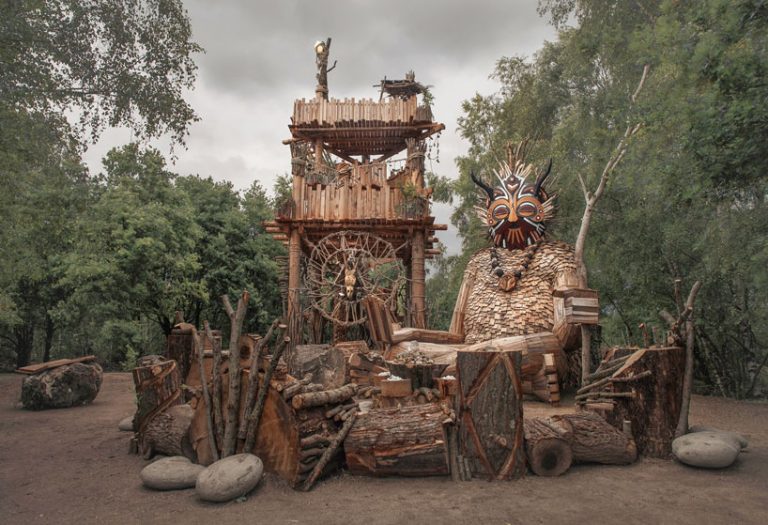 thomas dambo builds 7 giant trolls made from reclaimed wood in belgian ...