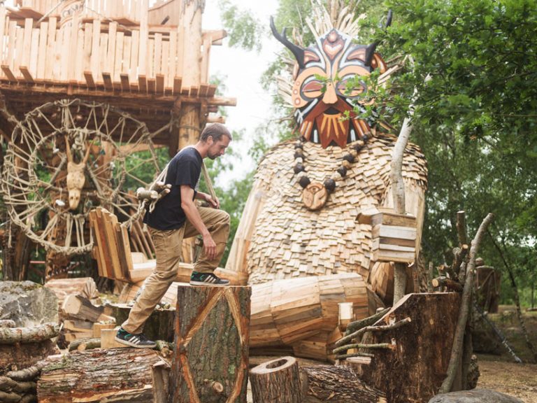 thomas dambo builds 7 giant trolls made from reclaimed wood in belgian ...