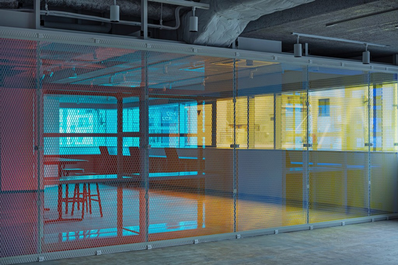 tsubame architects designs panasonic's future life factory with metal +neon