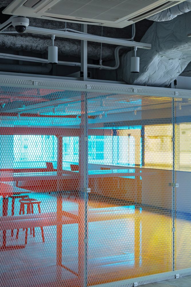 tsubame architects designs panasonic's future life factory with metal +neon