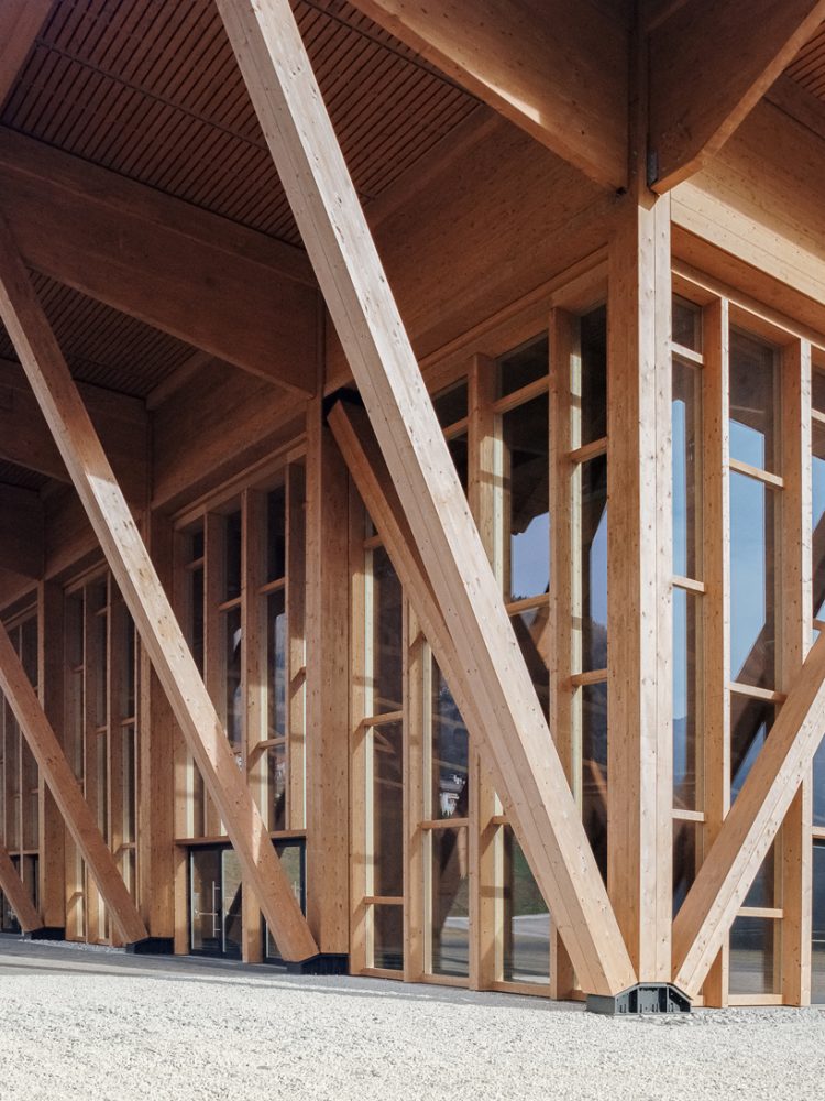 rhythmic timber structure punctuates the vast northern italian landscape