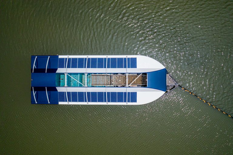 the ocean cleanup unveils floating interceptor that catches plastic in ...