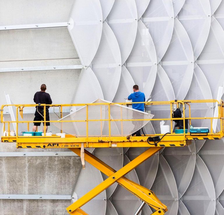 wulf architekten designs perforated metal façade for cologne's parking ...