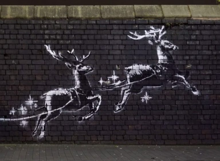 banksy unveils reindeer mural highlighting homelessness during holidays