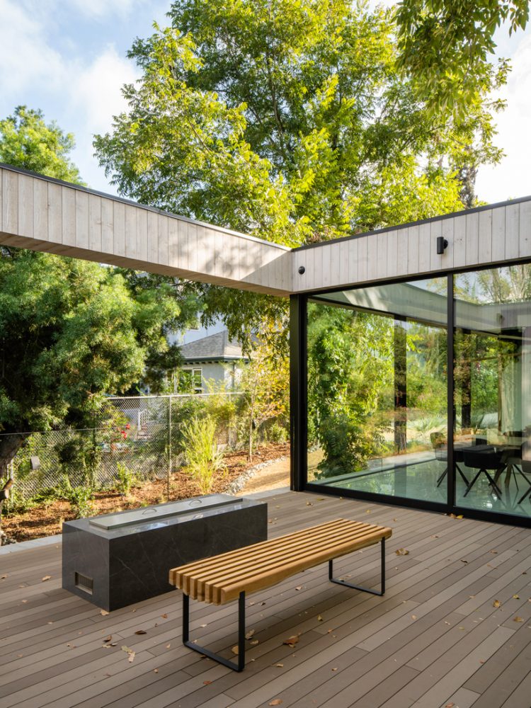 DBA's bridge house spans 60 meters over a natural stream in los angeles