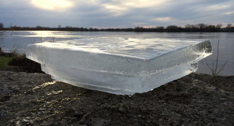 the ice urn floats whilst slowly returning cremated remains to nature