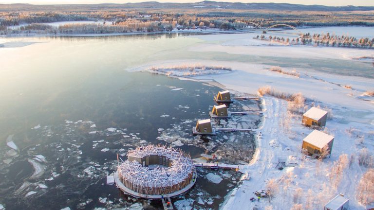 sweden's floating, circular 'arctic bath' hotel opens on the lule river