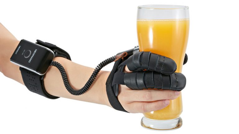 the neomano robotic glove powers people with hand paralysis