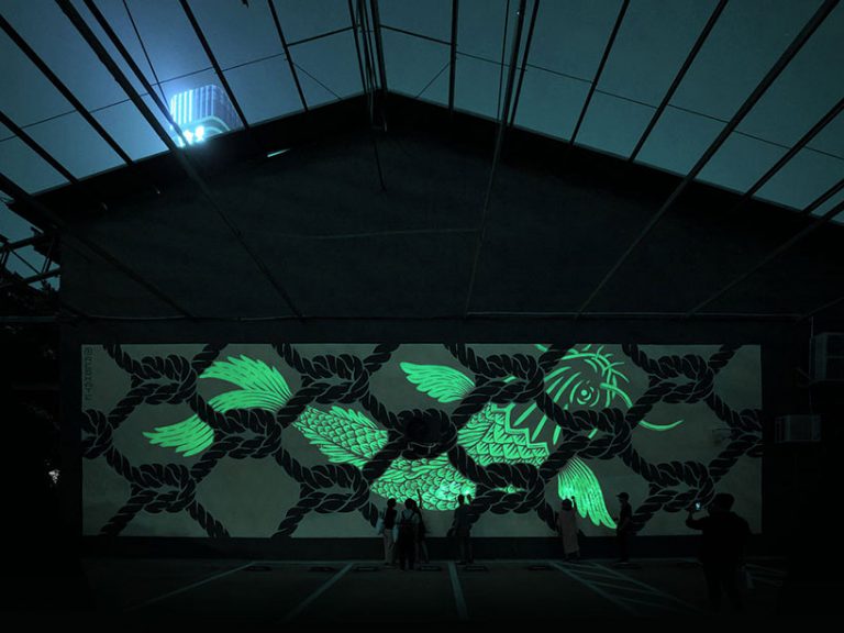 reskate studio unveils three glow-in-the-dark street murals with hidden ...
