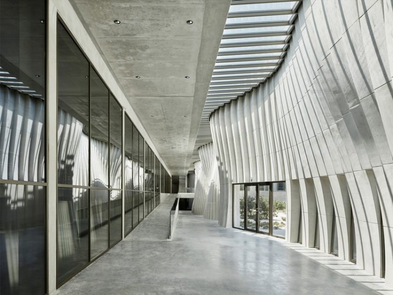 carl fredrik svenstedt adds cellar clad in curving solid stone to delas ...