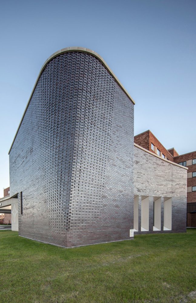 PLY+ wraps st mary chapel in curved brick shell with a woven pattern in ...