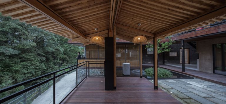 shulin architectural design sets stone + wood hotel within an ancient ...