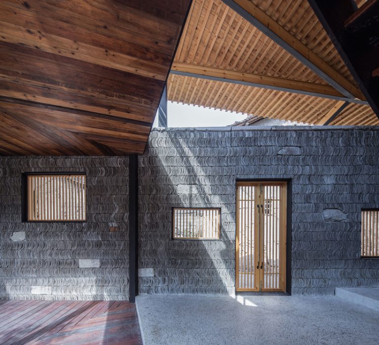 shulin architectural design sets stone + wood hotel within an ancient ...
