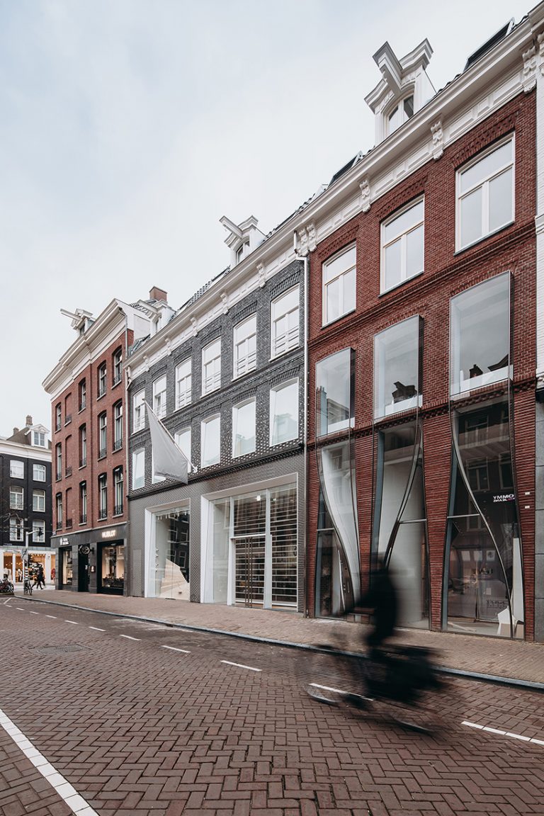 UNStudio adds pixelated glass + stainless steel façade to louis vuitton ...