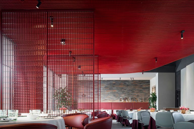 red rattan metal wraps around a restaurant in chengdu designed by IN • X