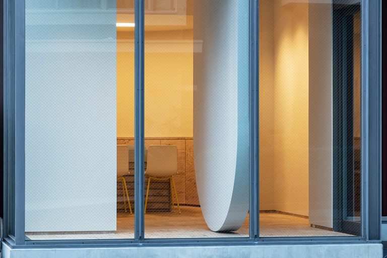 mtka uses U-shaped rotating door to divide this 28 sqm art gallery in tokyo