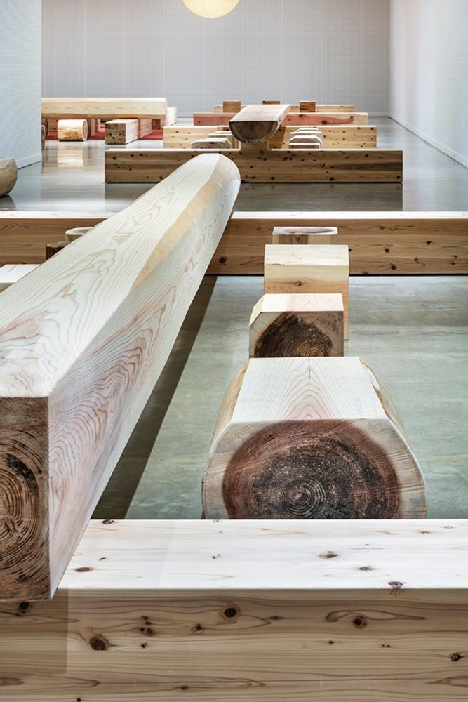 TORAFU architects renovates museum gallery with cedar logs as benches ...