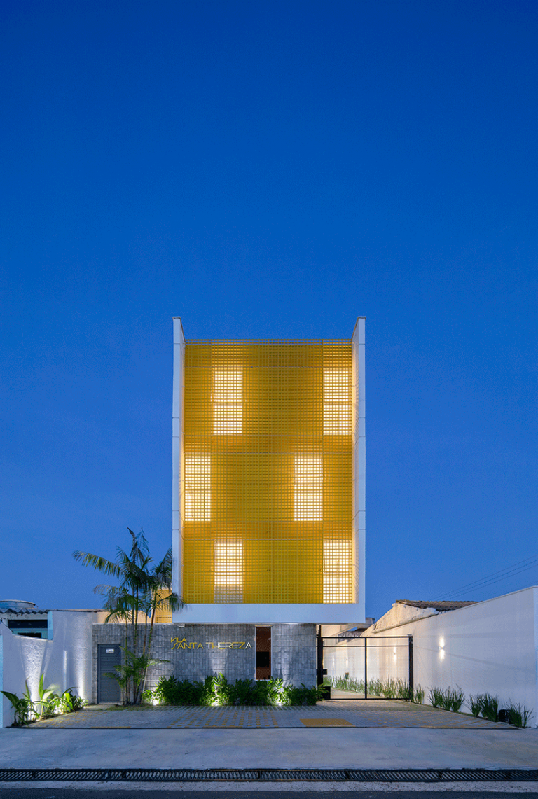 laurent troost adds bright yellow metal lattice facade to apartment ...