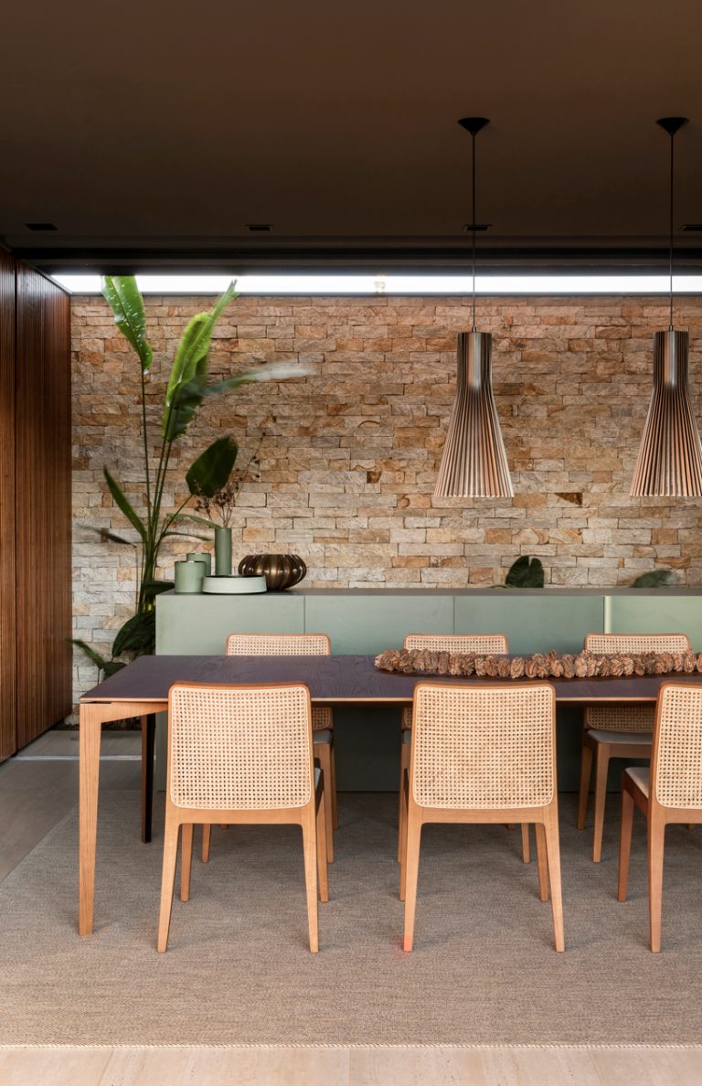 mf+arquitetos applies black cobogó bricks to house in franca, brazil