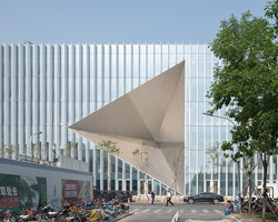 EVA architecture designs flowing glass-covered sustainable building in ...