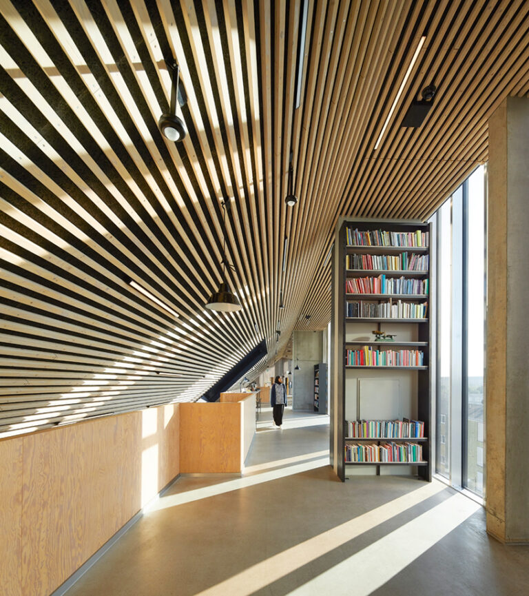 hufton + crow captures COBE's wedge-shaped library in copenhagen