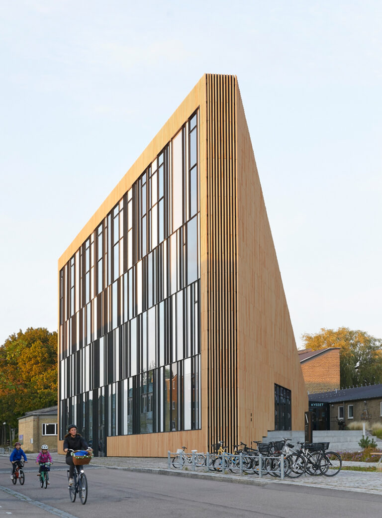 hufton + crow captures COBE's wedge-shaped library in copenhagen