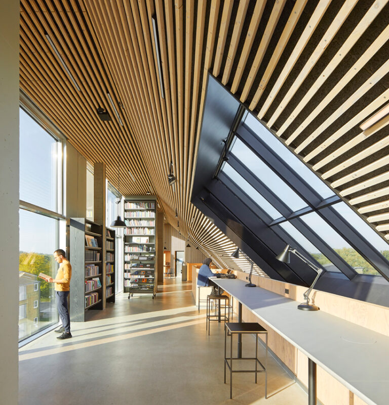 hufton + crow captures COBE's wedge-shaped library in copenhagen