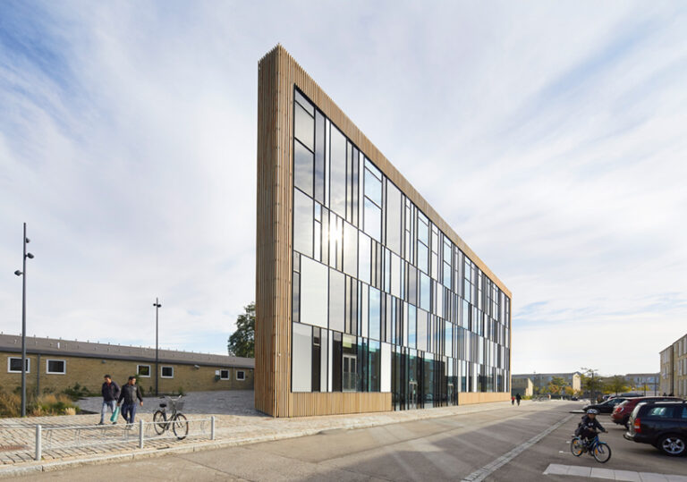 hufton + crow captures COBE's wedge-shaped library in copenhagen