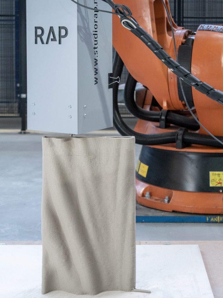 3D-printed ceramic tiles clad the gates of studio RAP's residential ...