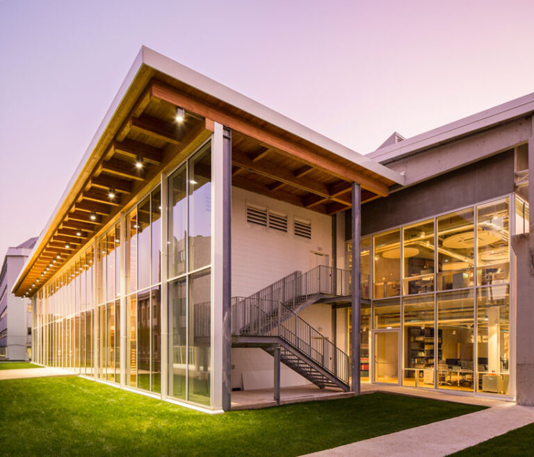 AMDL CIRCLE's Z-LIFE occupies a glass box within an industrial factory