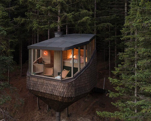 new woodnest treehouses suspended among the norwegian woods