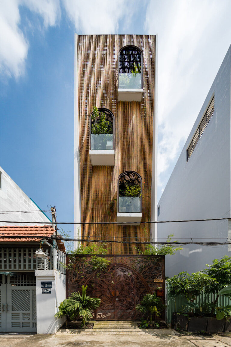 woven bamboo façade clads atelier ngng's 'floating nest' house in vietnam