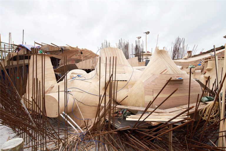 MAD architects' 'wormhole library' nears completion in haikou, china
