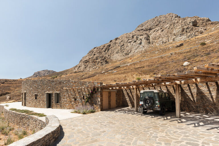 sinas architects embeds a stone house into serifos island in greece
