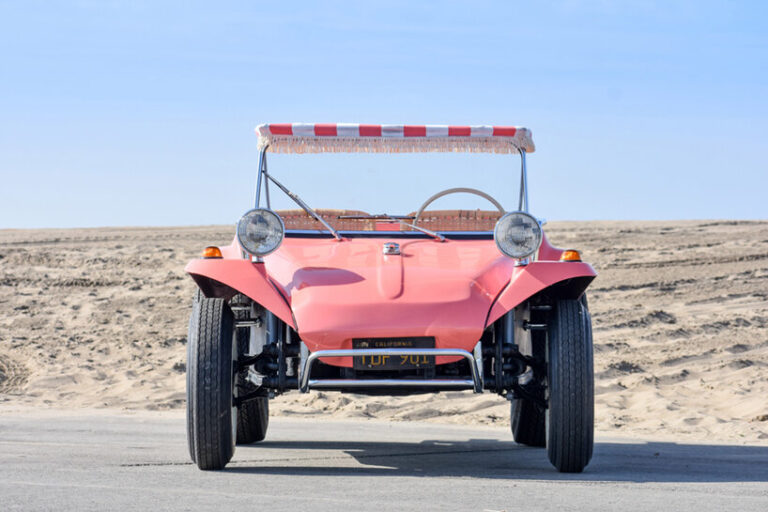 pink volkswagen buggy refurbished in a vintage and beachy jolly-style