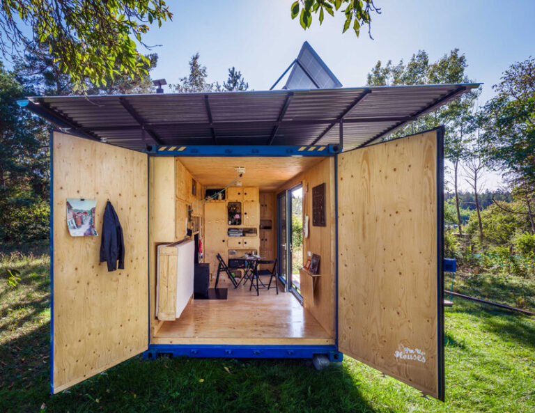 this tiny cabin made from an upcycled shipping container is self-sufficient