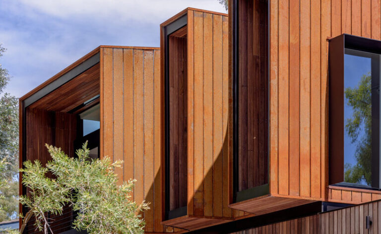 extruded windows clad in corten steel complete ben walker architects ...