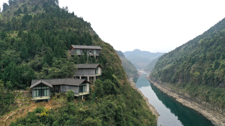 202 village guesthouses emerge from forested hunan as natural peaks