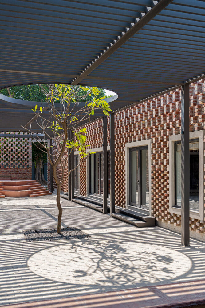 RLDA designs 'brick house' in new delhi with perforations and projections