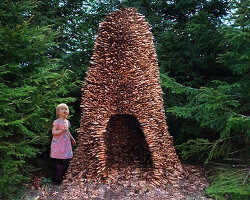 this leaf hut reflects the beauty of ephemeral life, celebrating fall