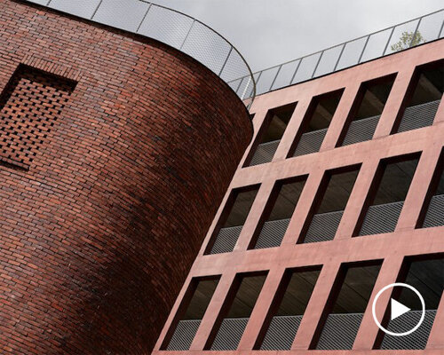 this undulating brick façade imitates the movement of draped fabric