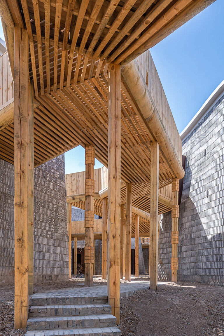 network of floating timber bridge unites nine scattered grottos in ...