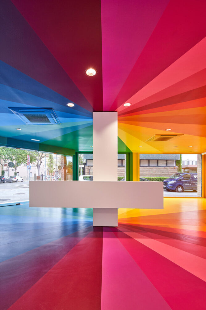 studio animal completes rainbow-hued 'spectrum' store in barcelona