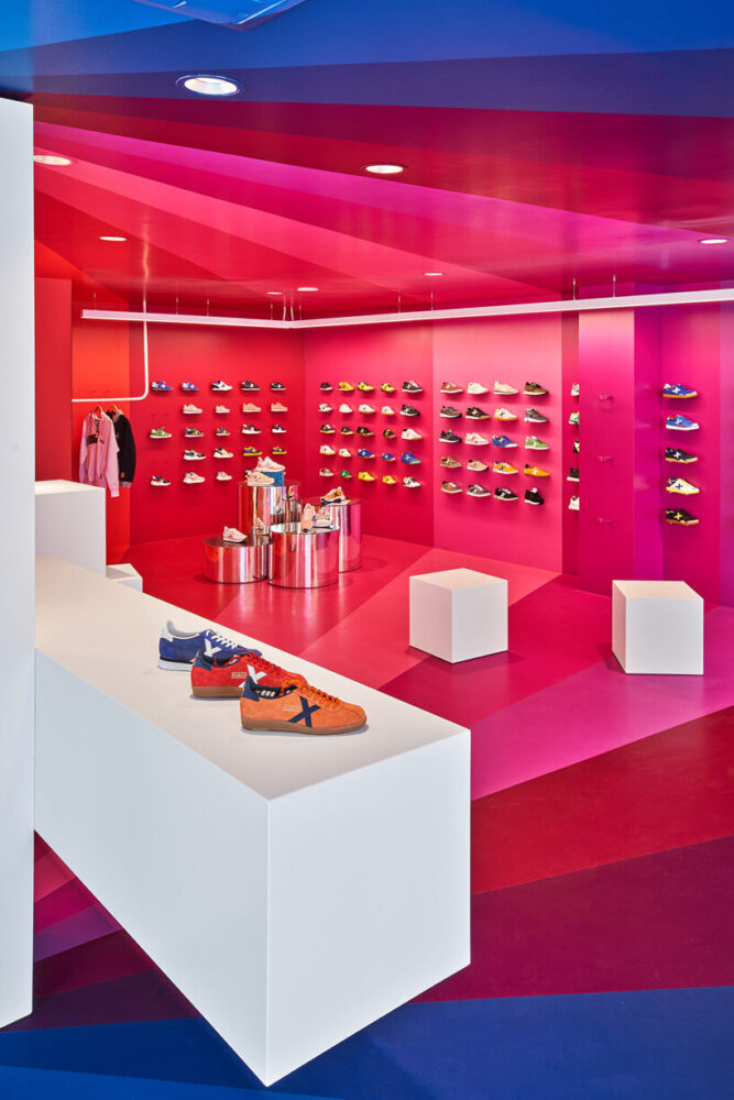 studio animal completes rainbow-hued 'spectrum' store in barcelona