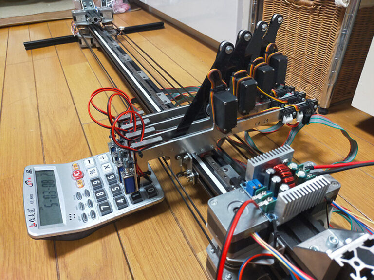 A-HOGE is a calculator-playing robot that can perform mozart