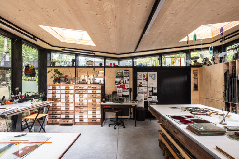 prefabricated artist studio nestles within the verdant backyard of a ...