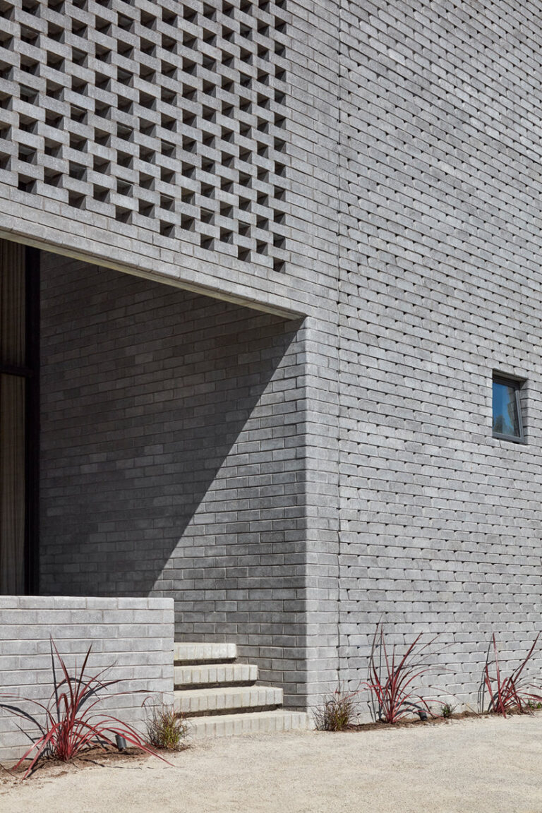 LLDS wraps its 'cuboid house' with robotically-generated skin of grey brick