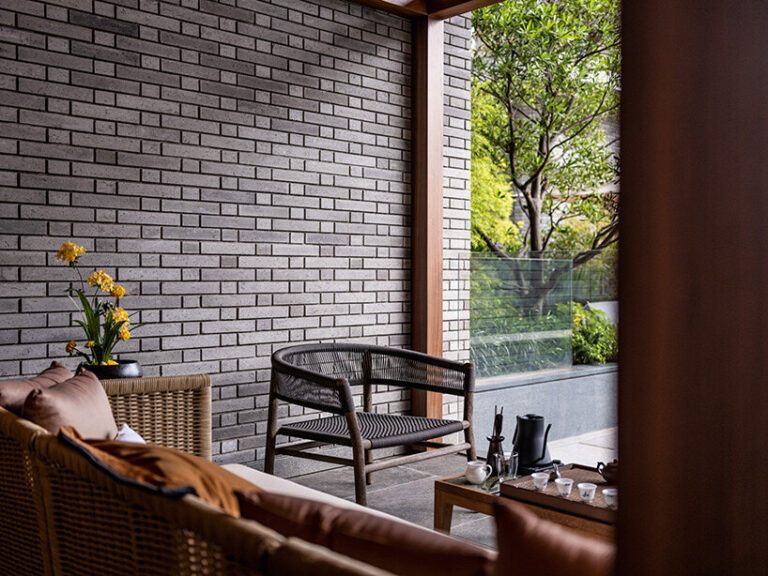 via. reinterprets vernacular chinese architecture in hong kong atrium house