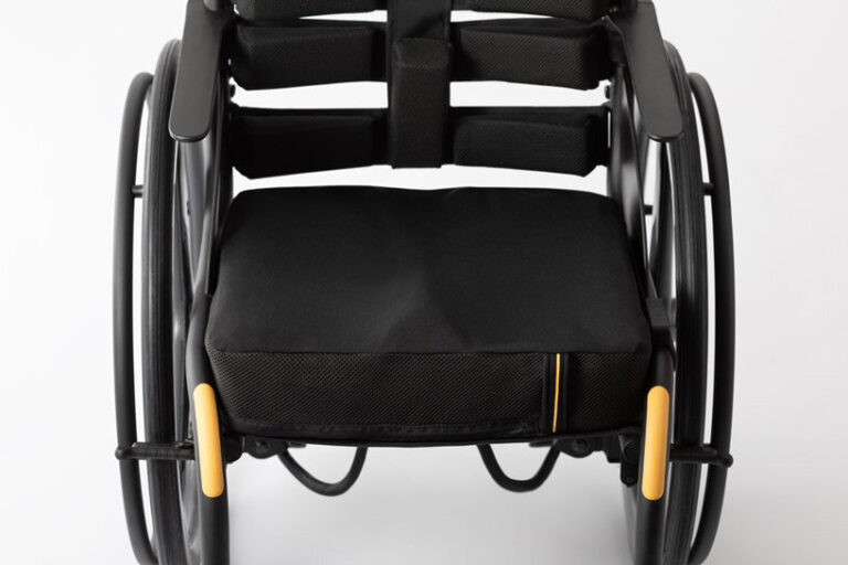 wheeliy foldable wheelchair features yellow accents for intuitive handling