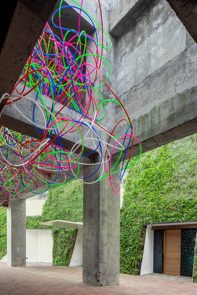 shiroiya x kengo kito fills hotel with 2,500 illuminated festive hula hoops